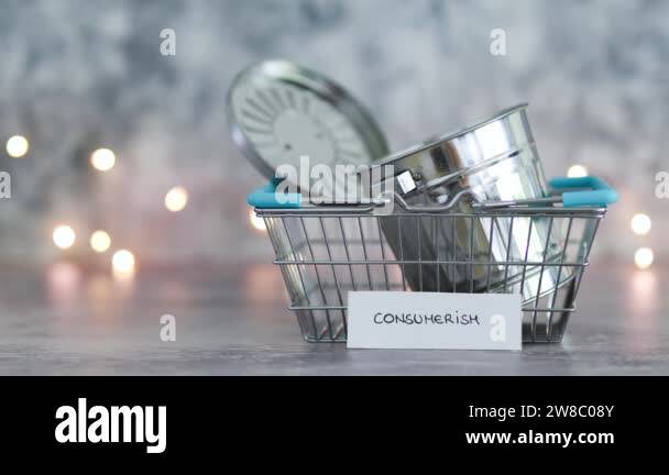 consumerism conceptual image, shopping basket symbol of good to be ...