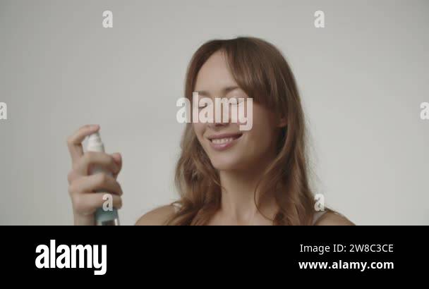 Beautiful young woman spray Stock Videos & Footage - HD and 4K Video ...