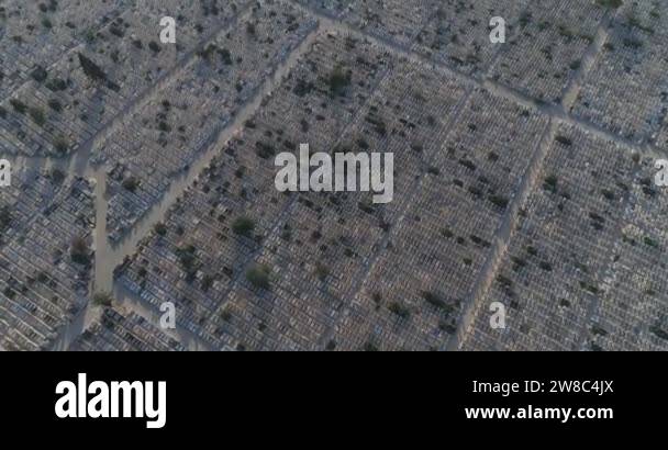 Cemetery graves aerial view above graveyard cemetary with gravestones ...