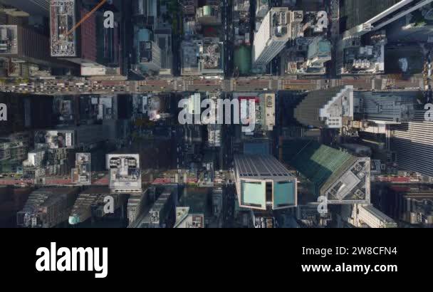 Aerial birds eye overhead top down panning view of downtown streets ...