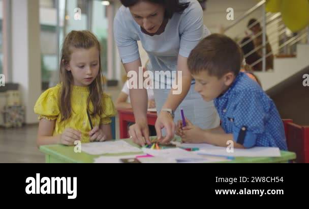 creative kids during an art class in a daycare center or elementary ...