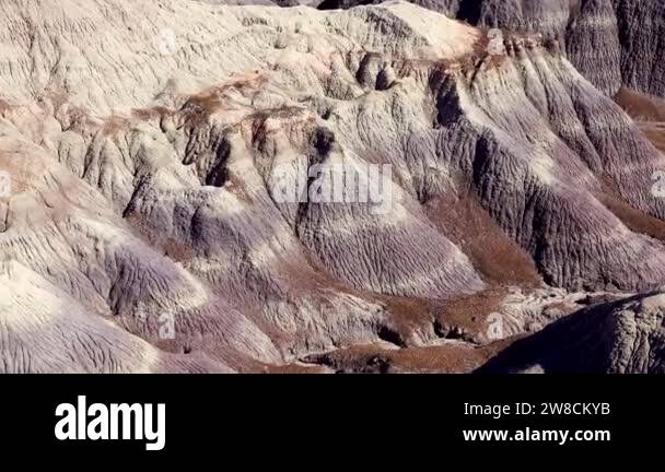 Petrified Forest National Park, Erosion of ancient multi-colored sedimentary rocks from which ...