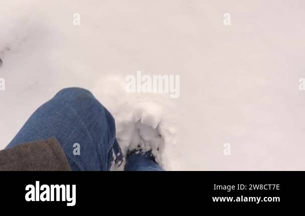 man walking in a deep snow in Cold weather -50 degrees Celsius ...