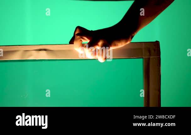 Stage Operator Holding Green Screen In Front Of Lighting Stock Video ...