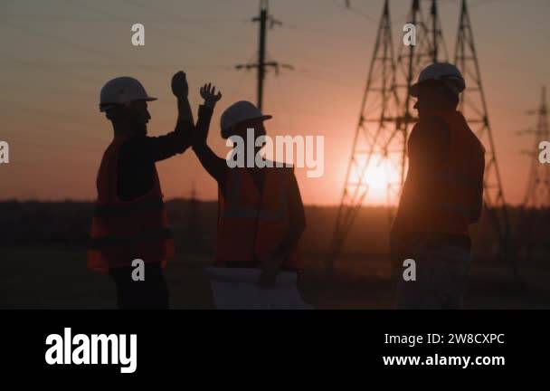 successful power grid project, team of professional engineers give each ...