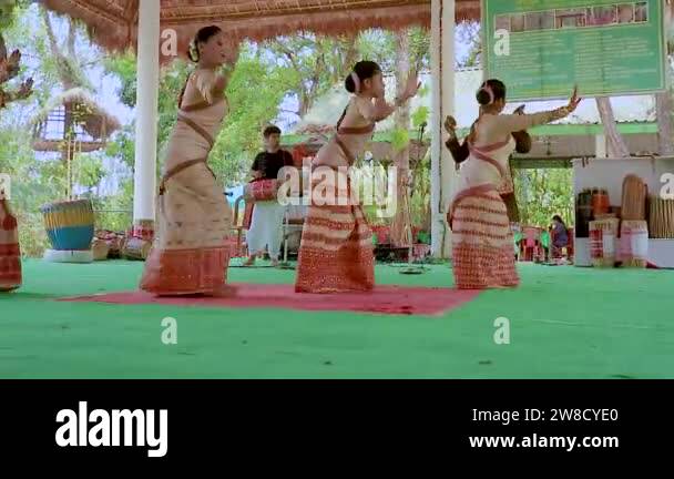 young girls performing authentic indian classical dance in traditional ...