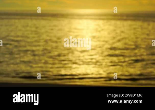 Bokeh sun glare reflection of Sunset sunrise light in water surface ...