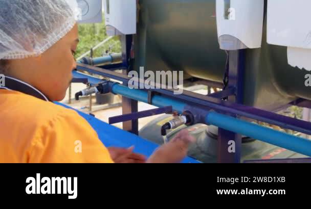 Animation of blue light beam over african american woman washing hands ...
