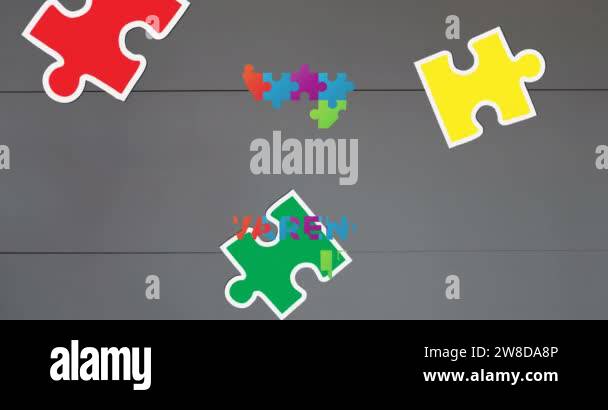 Animation of autism awareness month colourful puzzle pieces forming ...
