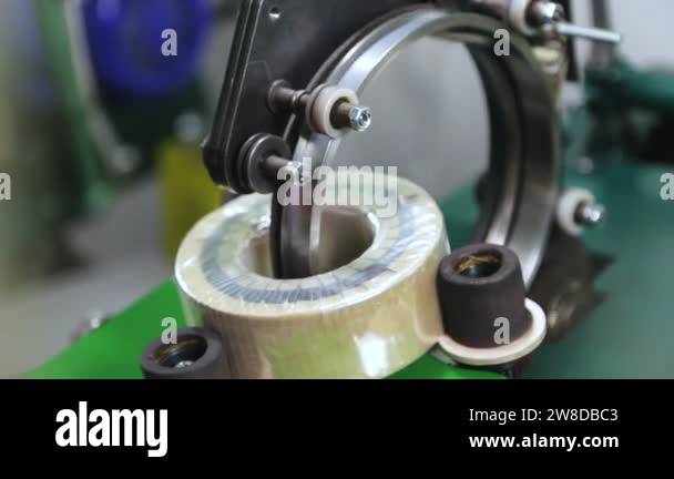 Industrial production and transformer winding. Toroidal transformer ...