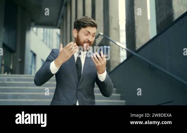 angry male businessman cry talking on the phone outside business man ...