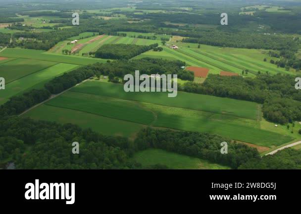 Massachusetts circa-2019. Aerial view of green farm lands. Shot from ...