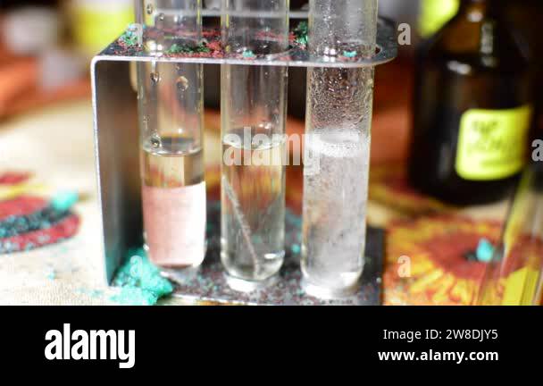 We Perform Chemical Experiments - Mix Reagents ignite, see the result Stock Video Footage - Alamy
