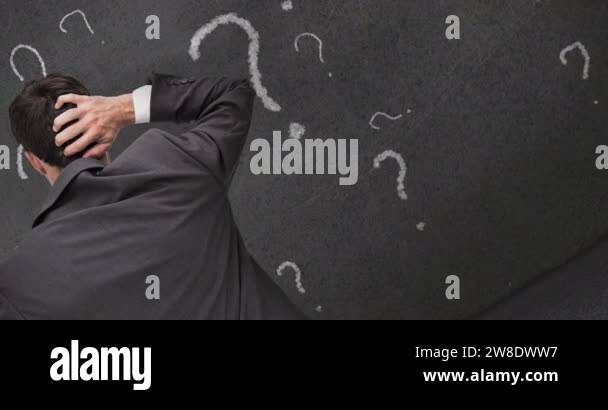 Rear view of confused caucasian businessman scratching head, with ...