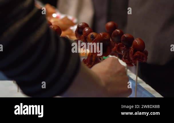 Slow motion of red octopus with the head stuffed with egg is a local ...