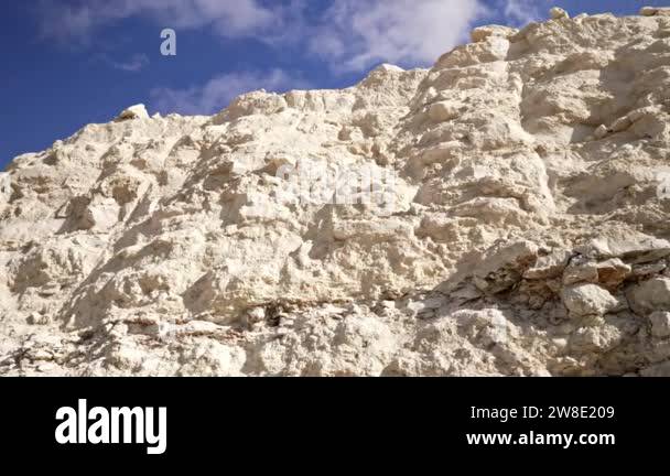 White limestone rock formation. Open pit mining mineral quarry ...