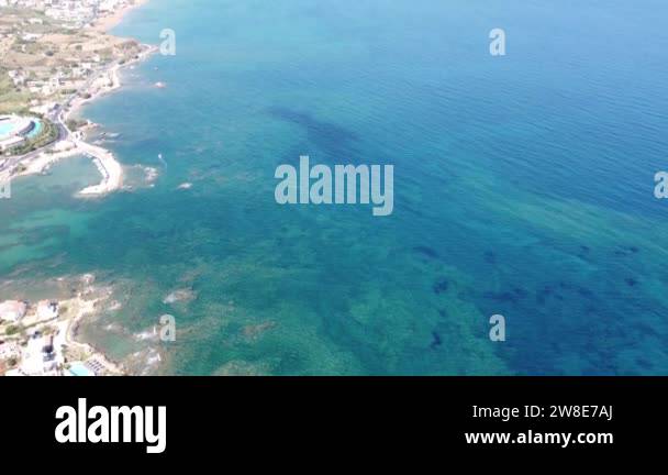 Aerial video view from drone on underwater reefs and coastal rocks in ...