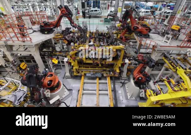 robots in high-tech production of the automotive industry, high ...