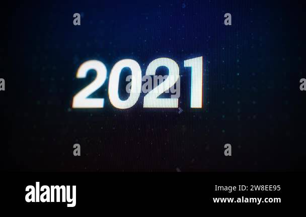 2021 year changing to 2022. White glowing digits on LCD computer screen ...