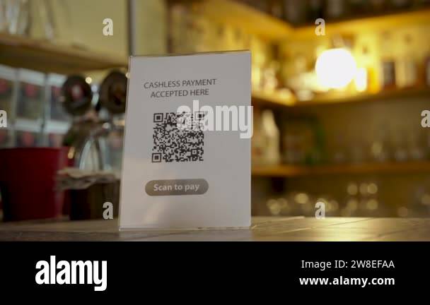 Hand scanning QR code. Contactless payment by smartphone via QR code ...