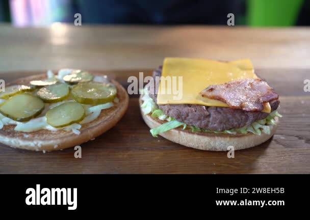 Making hamburger fast food ingredients Stock Videos & Footage - HD and ...
