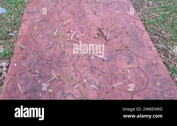 Playground Area With A Red Walking Path Stock Video Footage - Alamy