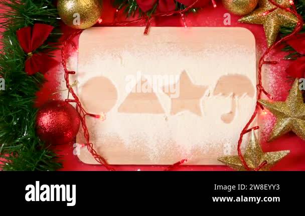 Cutting board with poured powder sugar and shapes of squid game dalgona ...