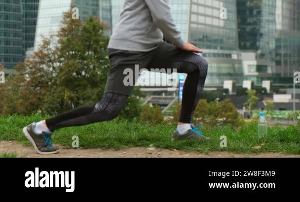 Muscular Shirtless Man Covered in Sweat Does Push-ups. Athletic , City ...