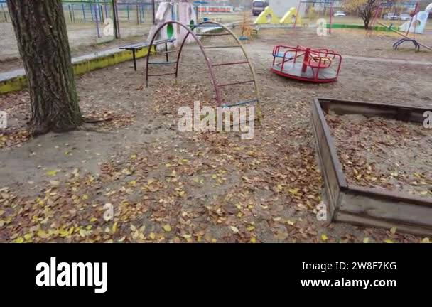 playground in half a multi-storey building. children's carousels on the ...