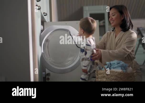 Mom son washing machine Stock Videos & Footage - HD and 4K Video Clips ...