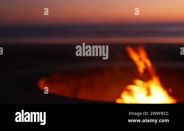 Campfire pit in California USA. Camp fire on twilight ocean beach ...