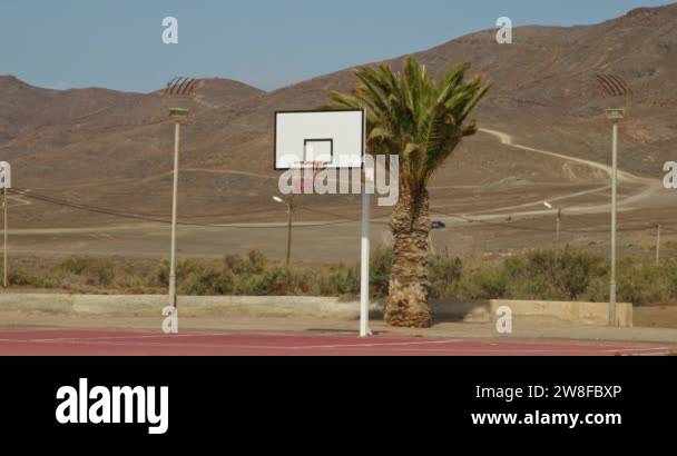 Empty basketball court on a tropical island. Close-up of a basketball ...