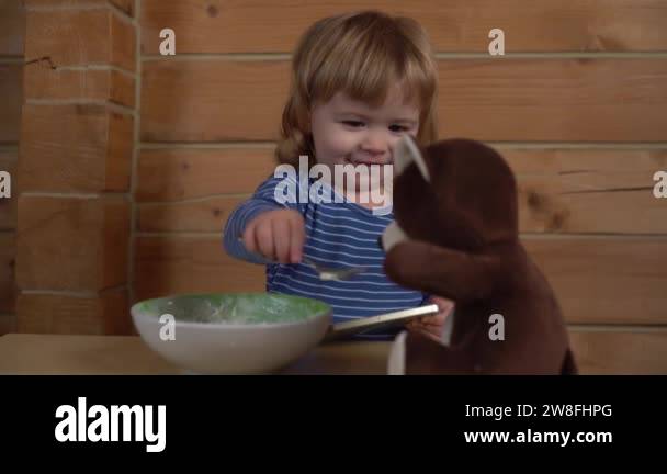 Feeding teddy Stock Videos & Footage - HD and 4K Video Clips - Alamy