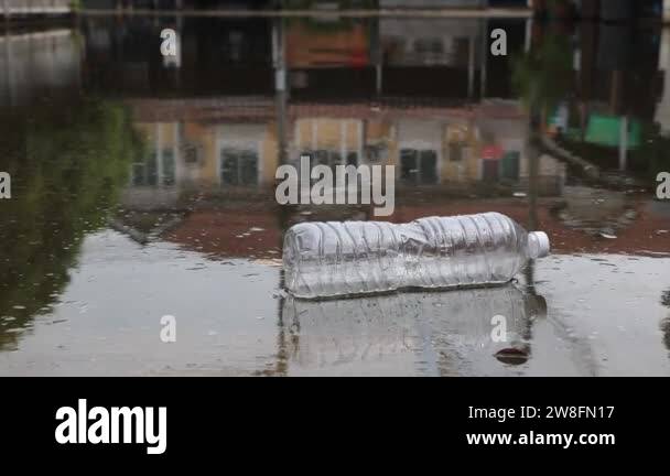 Puddle plastic floating Stock Videos & Footage - HD and 4K Video Clips ...