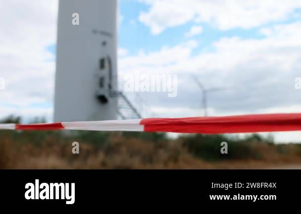 Signal tape marking the boundaries of the exclusion zone on the ...