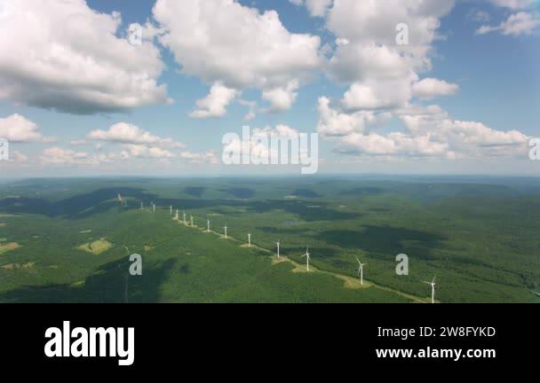Massachusetts circa-2019. Aerial view of farm lands and wind turbines ...