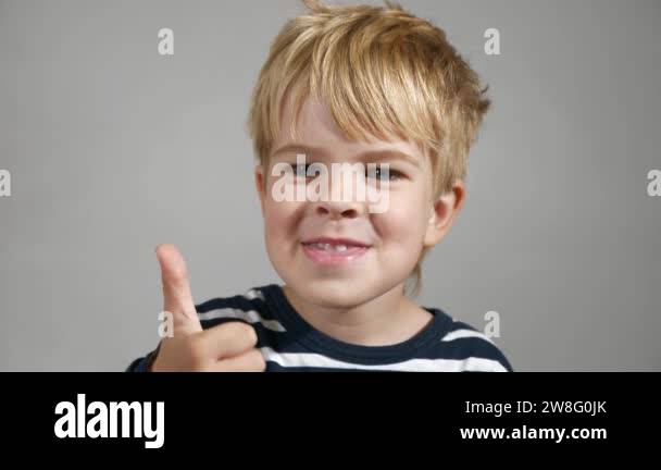 Child Shows Thumbs Up Gesture. Portrait Cute Little Boy. Happy Facial ...