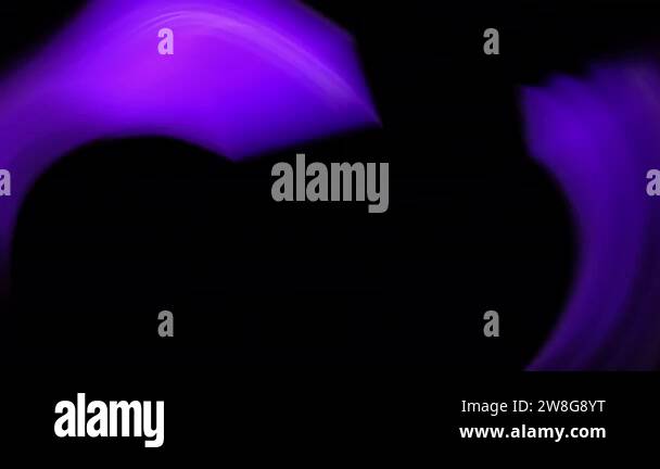 Motion blur with bright orange and purple lights on a black background ...
