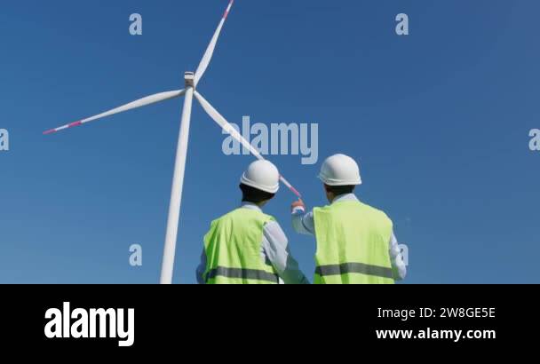 Engineers check parameters of rotating offshore wind turbine Stock ...