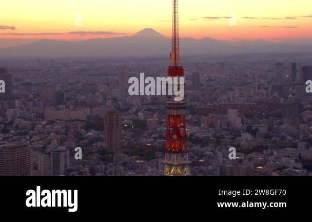 Tokyo, Japan circa-2018. Flying over Tokyo with view of Tokyo Tower and ...