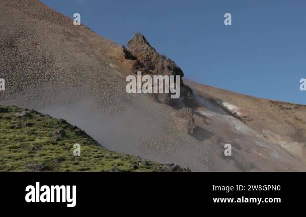 Iceland. Geothermal field with fumaroles and geysers. Area with natural ...