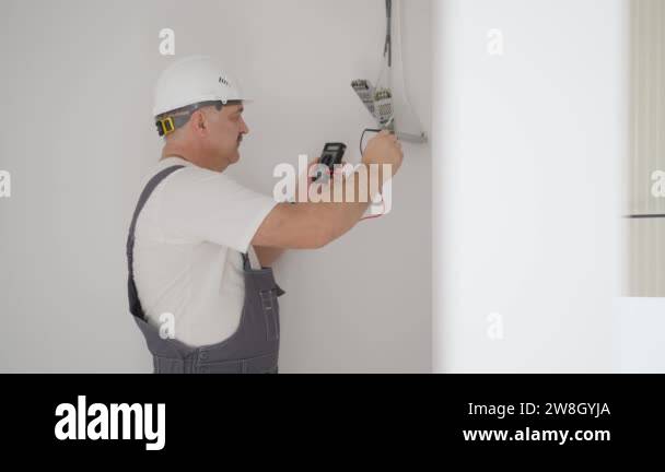 Electrician installing low voltage Stock Videos & Footage - HD and 4K ...