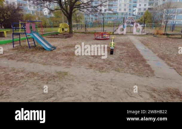 playground in half a multi-storey building. children's carousels on the ...
