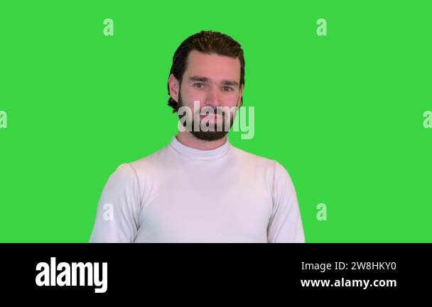Sporty guy talking on camera on a Green Screen, Chroma Key Stock Video ...