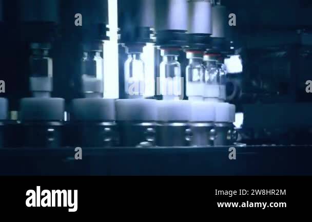Medical vials manufacturing line at pharmaceutical factory. Quality ...