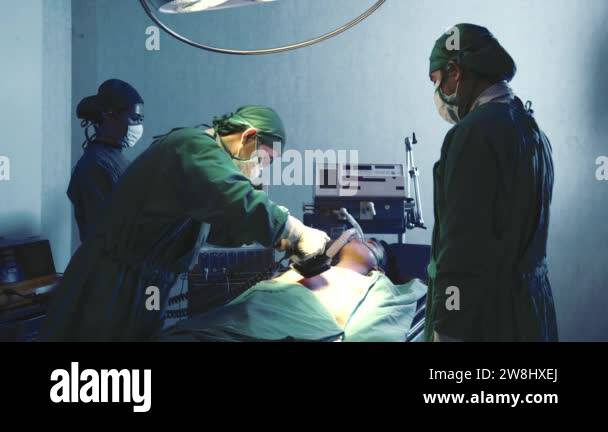 Defibrillation cardiac dysrhythmia, Surgical doctor team performing ...