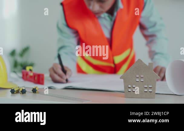 Engineers recheck house design for pre-construction. The construction ...