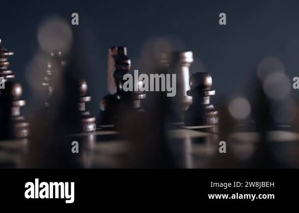 Board intelligence game - wooden chess. Close- up view of pieces on ...