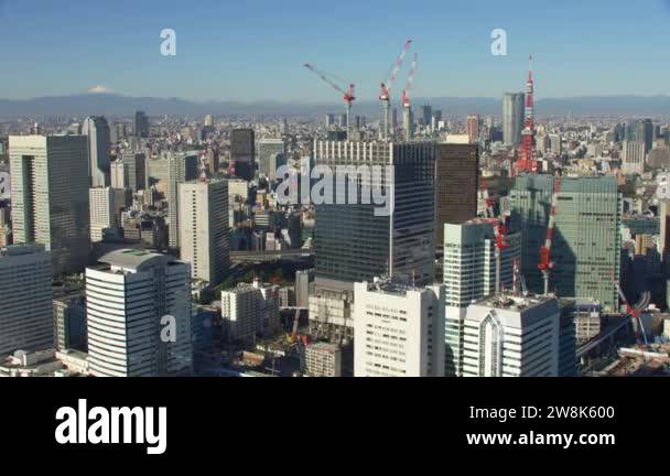 Tokyo, Japan circa-2018. Flying over Tokyo with view of Tokyo Tower and ...