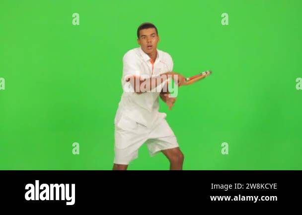 Professional tennis player makes different types of shots on a green ... Professional tennis player makes different types of shots on a green ...
